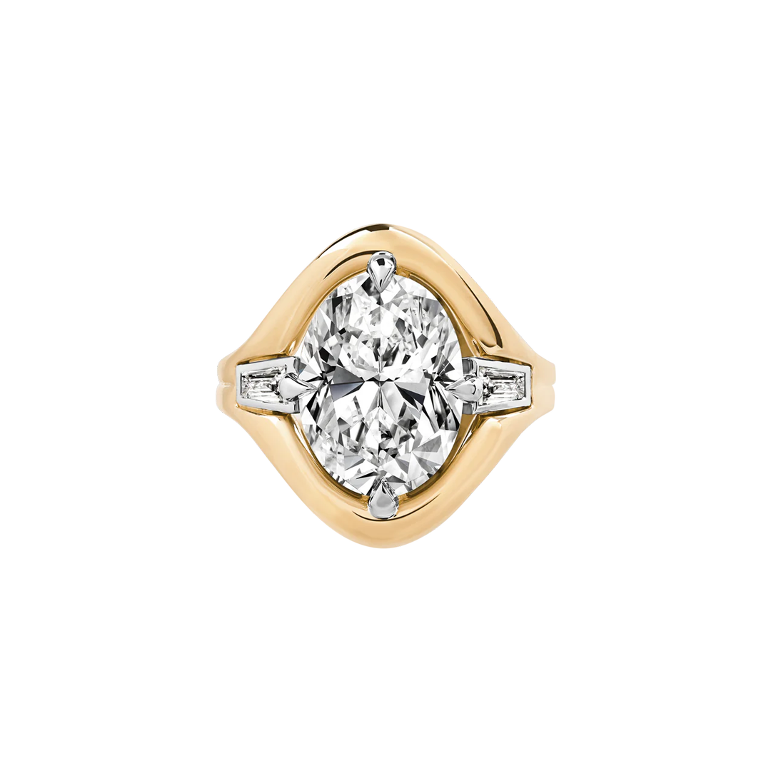 Oval Diamond Chunky Bezel Ring with Tapered Baguettes – C Heinrich Diamonds